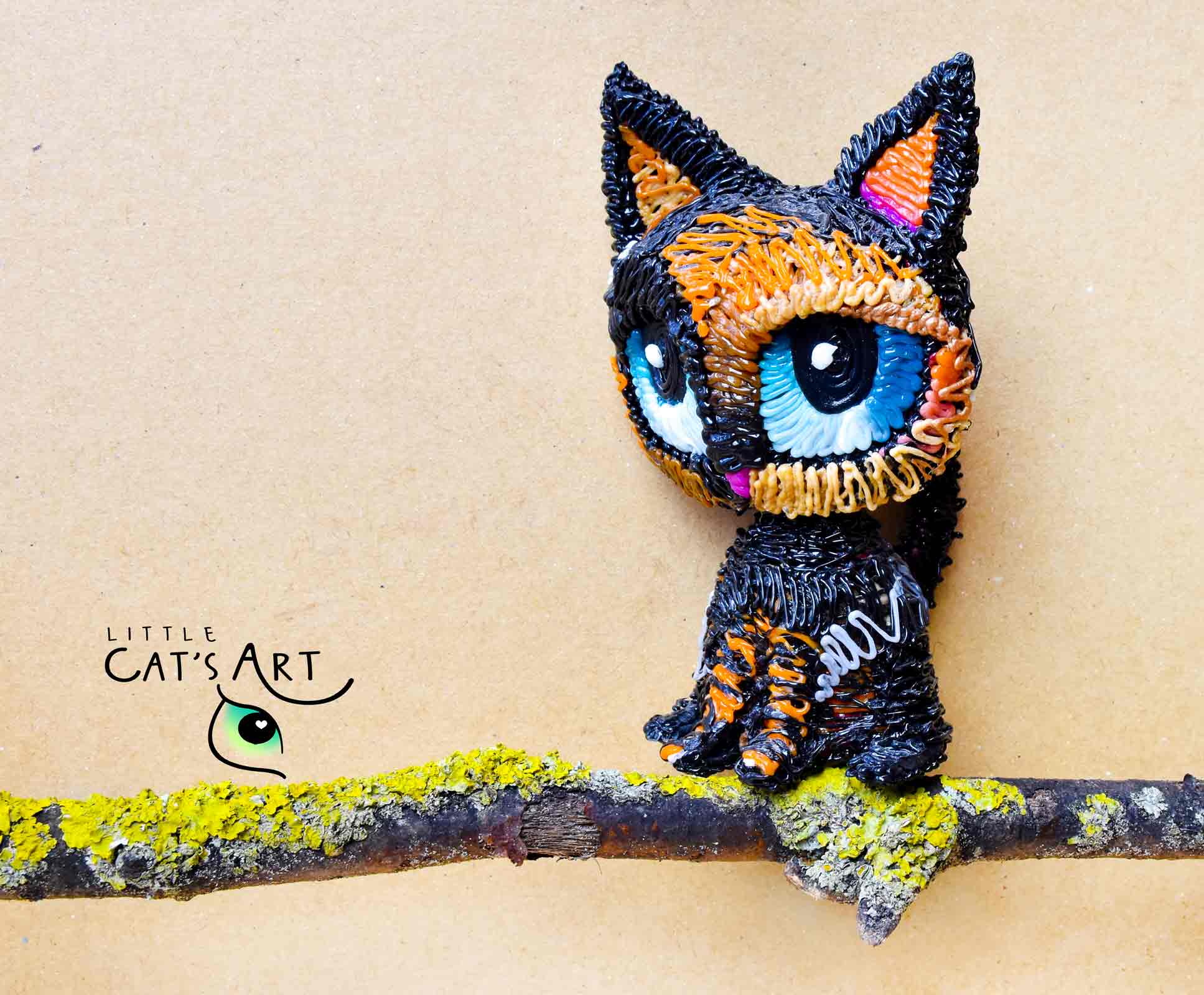 Tortoiseshell cat figurine with bright blue-green eyes - Little Cat's Art