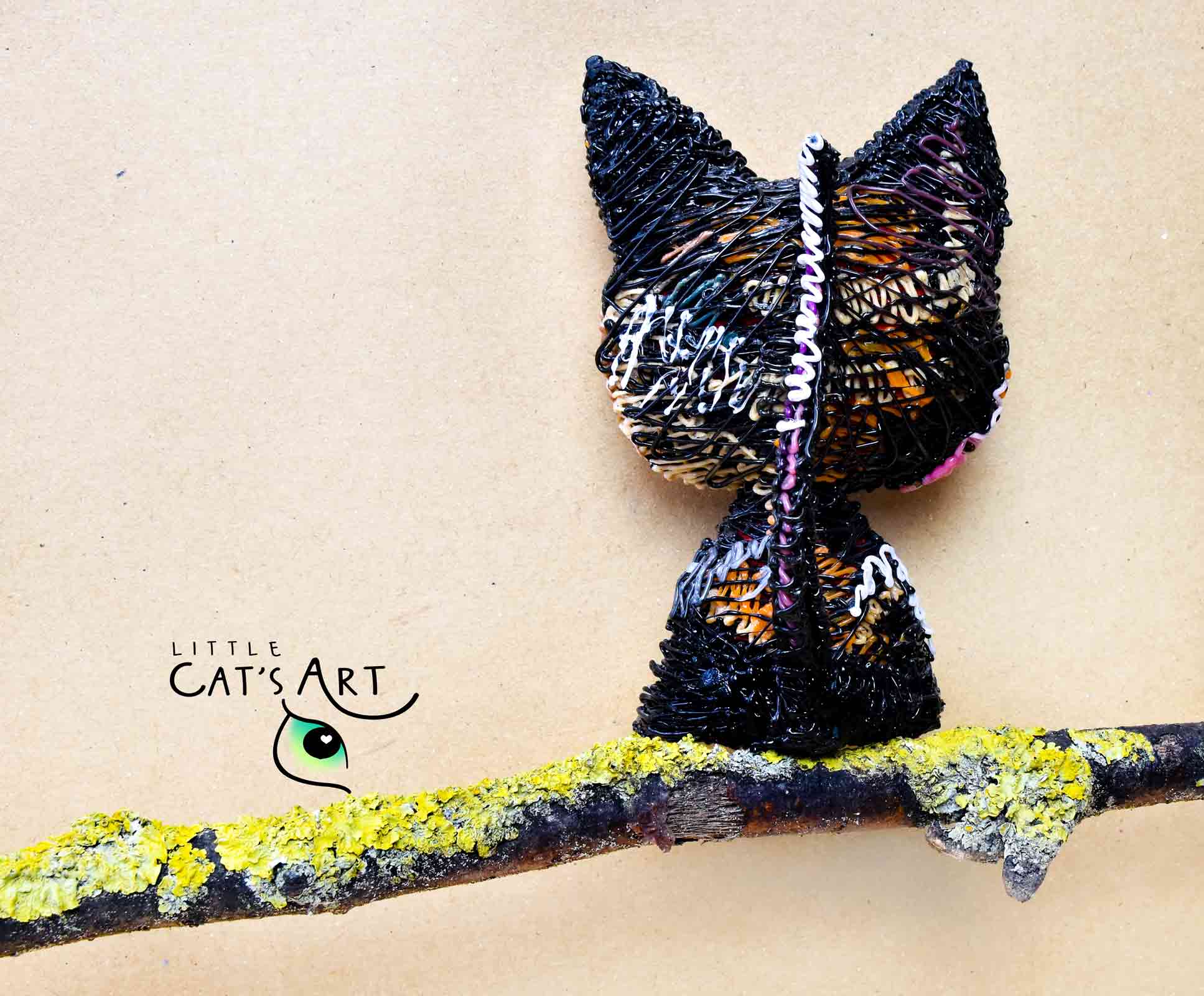 Tortoiseshell cat figurine with bright blue-green eyes - Little Cat's Art